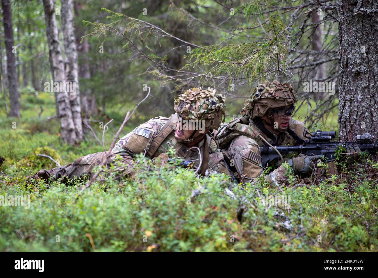 U.S. Army Sgt. George Babbage, left, and Spc. Liam Welch, right ...