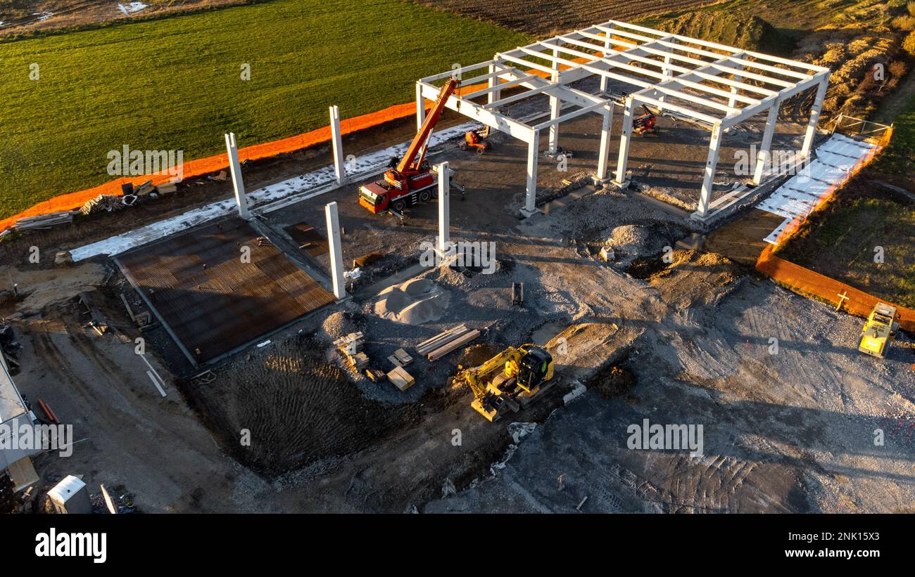 Prefabricated concrete skeleton frame building being constructed, building site. Shot with a ...