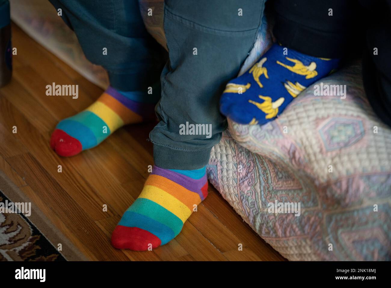 Rainbow socks worn by Jul Sirous, security manager during visit to a KyivPride LGBTQi shelter in ...