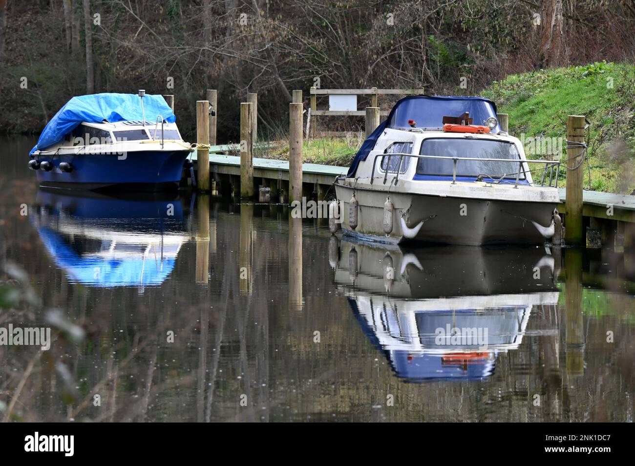 Two boats moored at Aldershot Wharf on the beautiful Basingstoke Canal ...