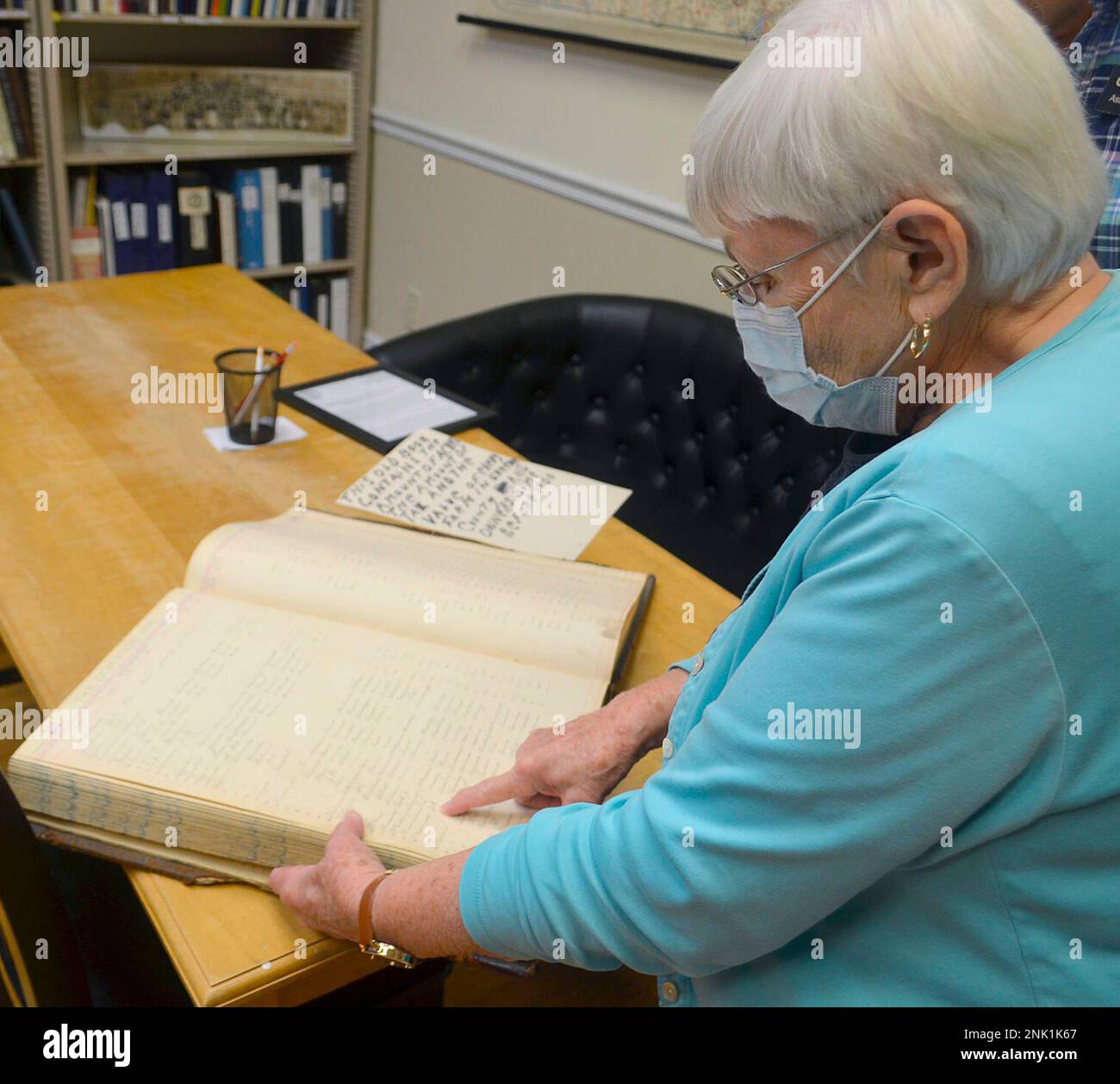 June Pinkston, who works at the T. Elmer Cox Genealogical & Historical ...