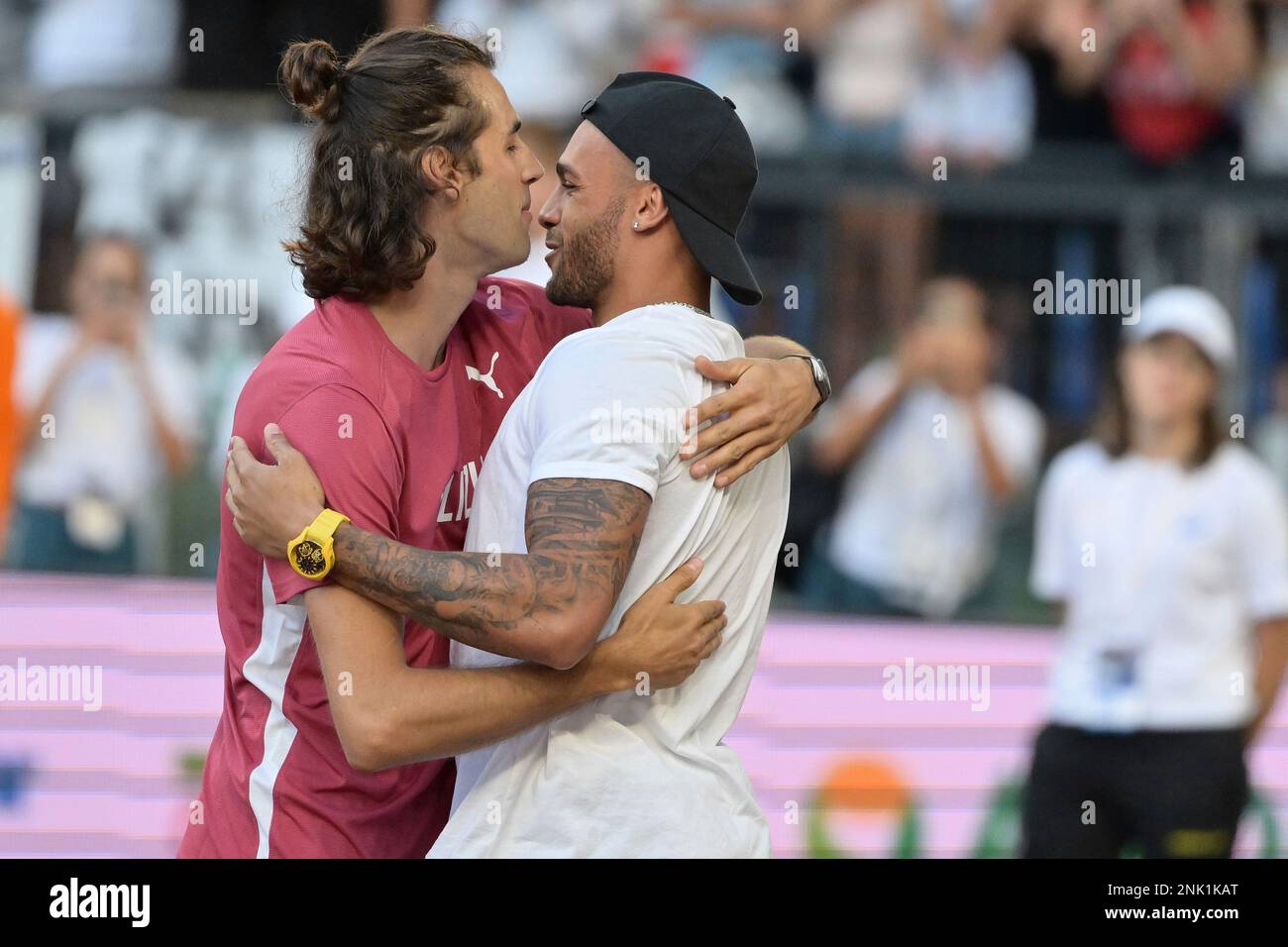 Marcell Jacobs, right, and Gianmarco Tamberi hug at the Golden Gala ...