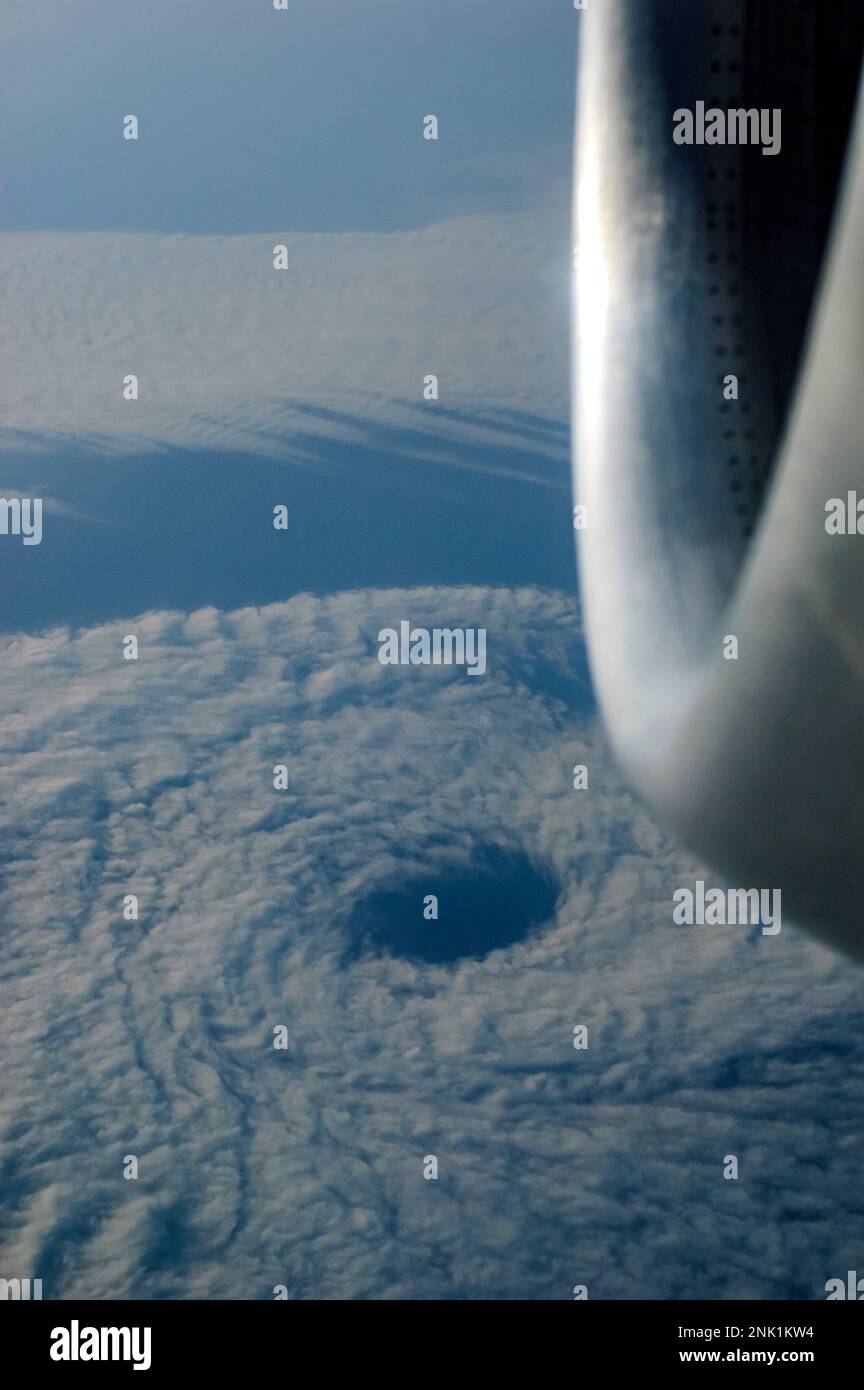 Cyclone seen from the window of a commercial flight over the coast of ...