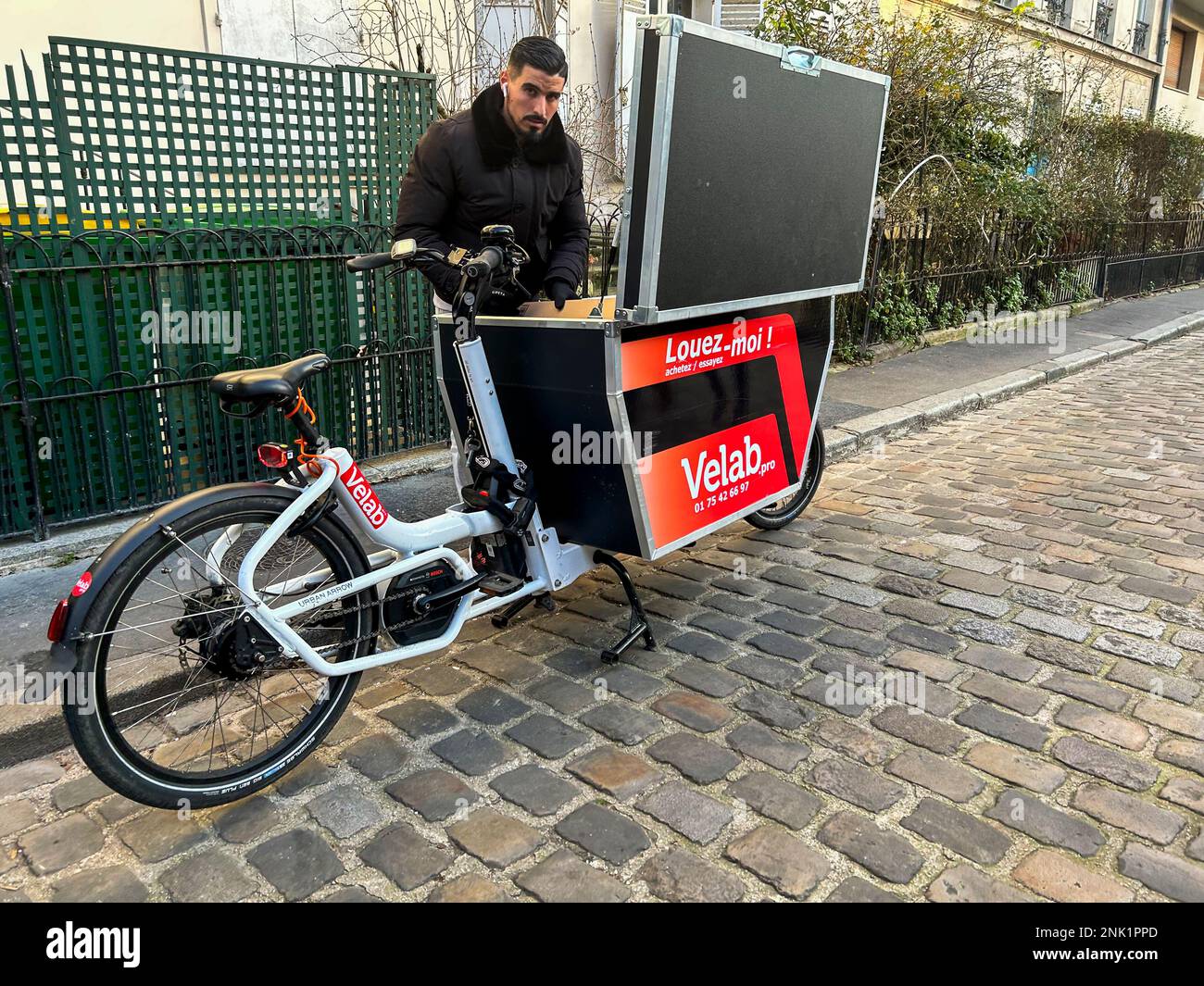Paris, France, Delivery Man using Electric Bicyle, Cargo Carrier ...