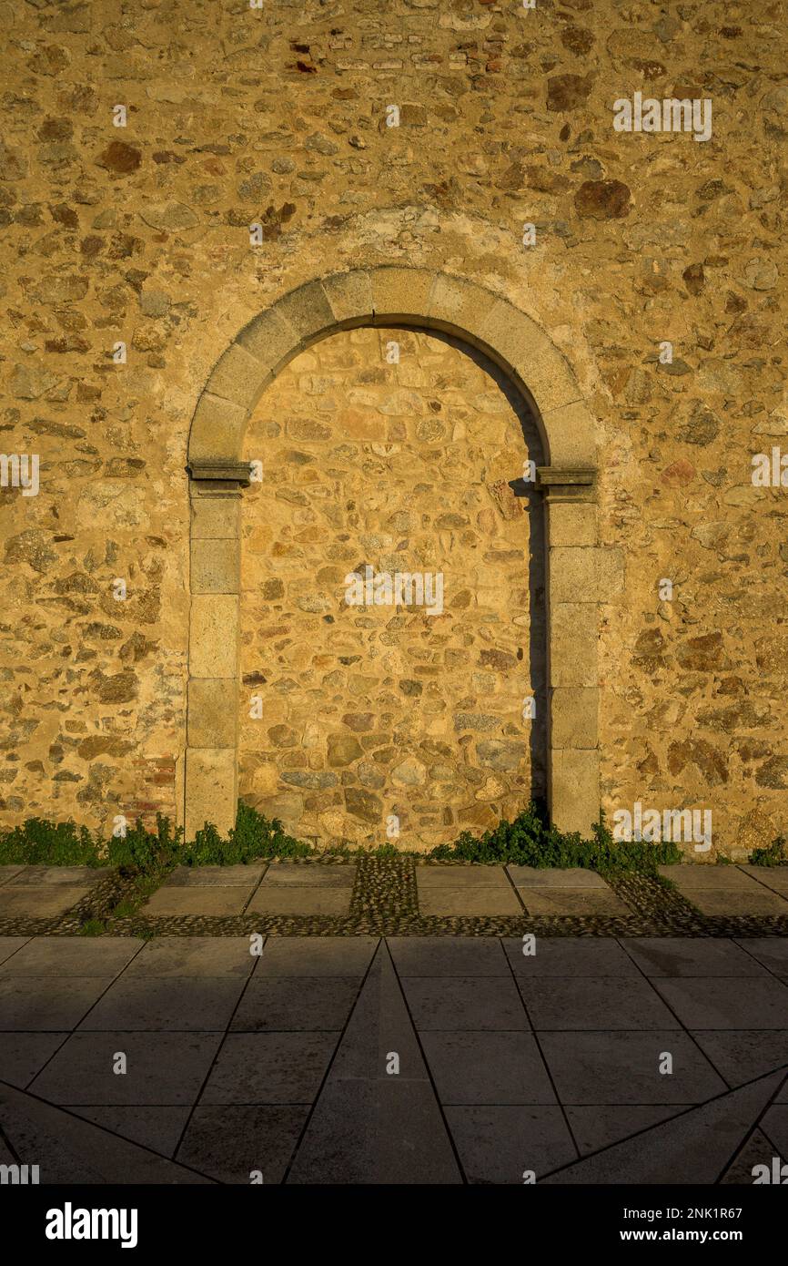 old stone door bricked up vertically to prevent entry Stock Photo - Alamy