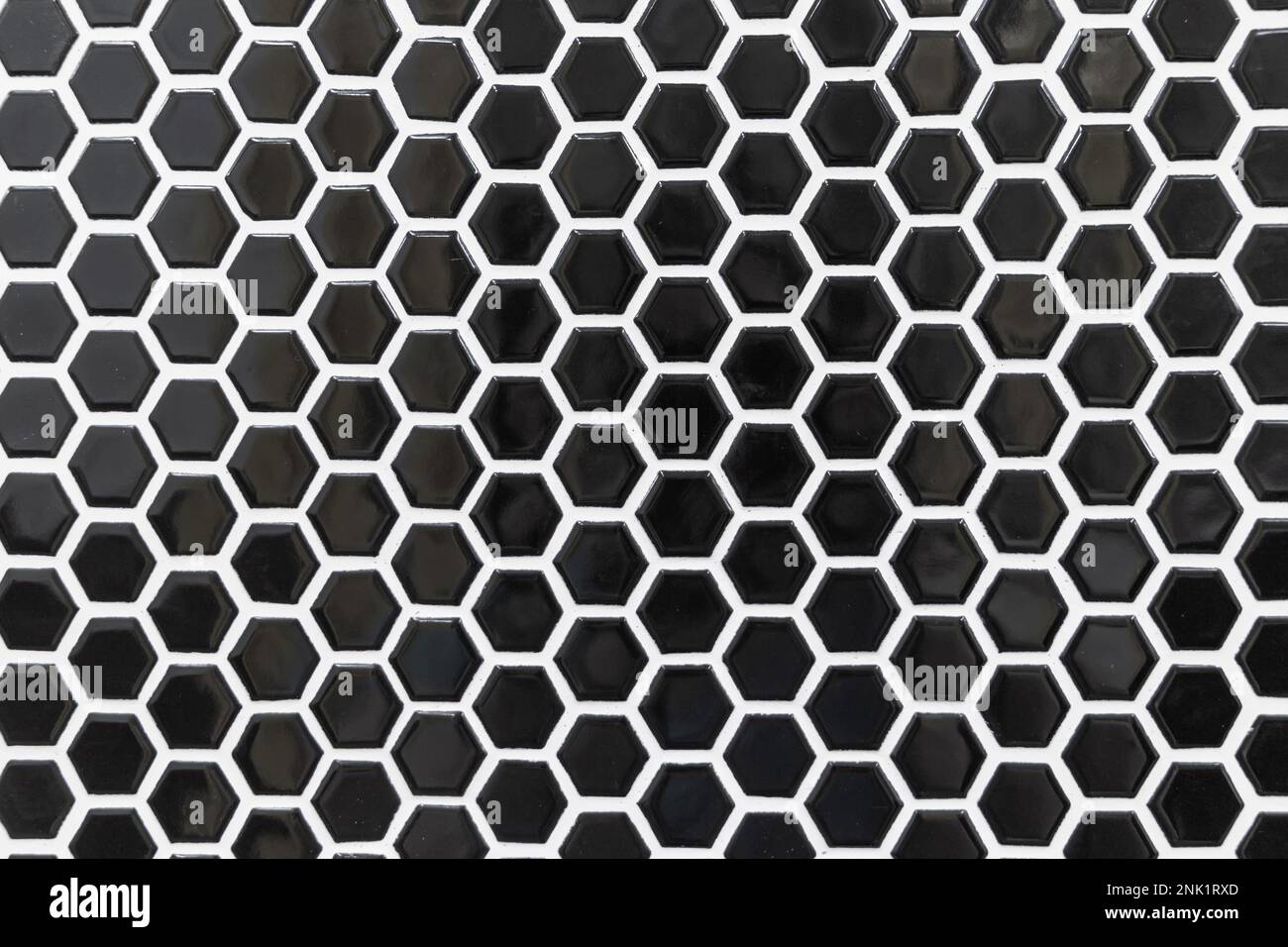 Black octagon tile with white grout in a backsplash, shower, bathroom ...