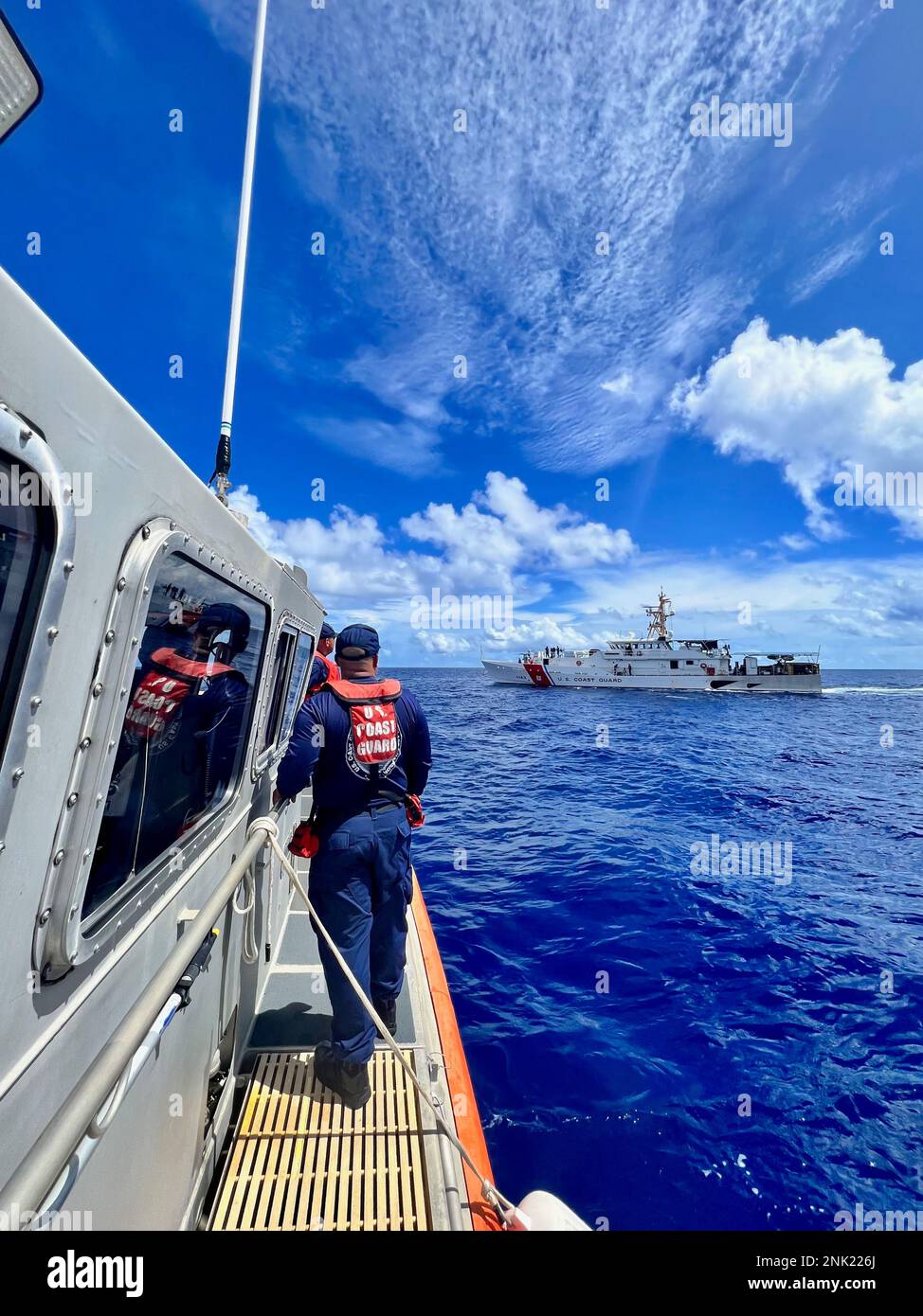 Members of a U.S. Coast Guard Station Apra Harbor 45-foot Response Boat ...