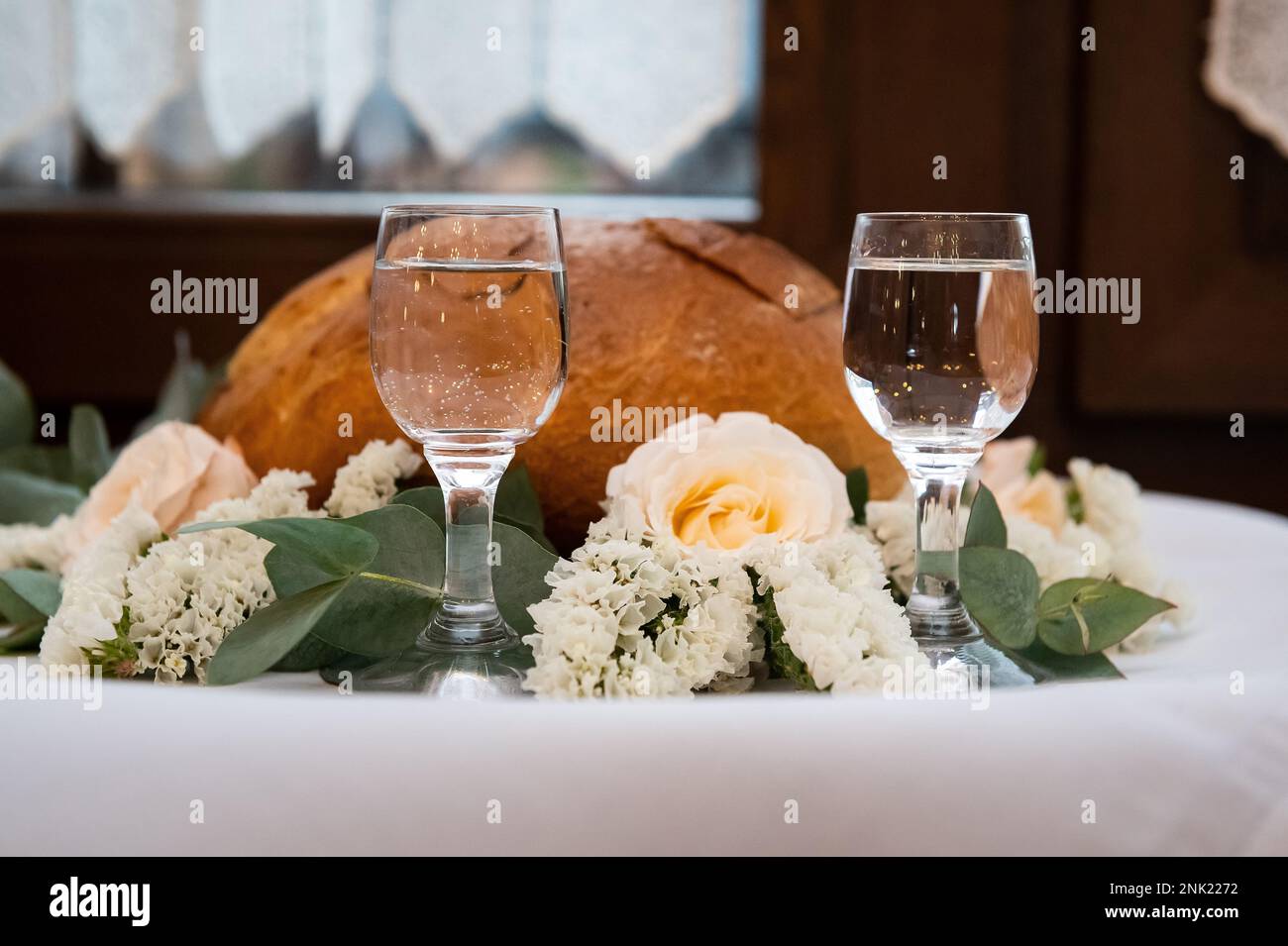 traditional wedding greeting bread with salt and vodka in glasses Stock ...