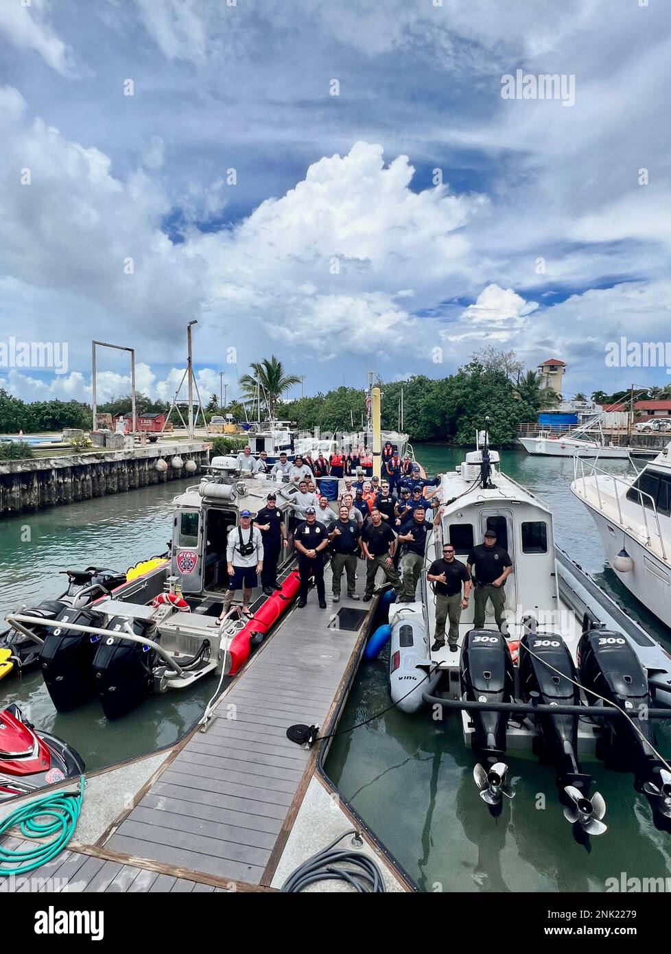 Responders take a moment for a photo at Agana Boat Basing following a ...