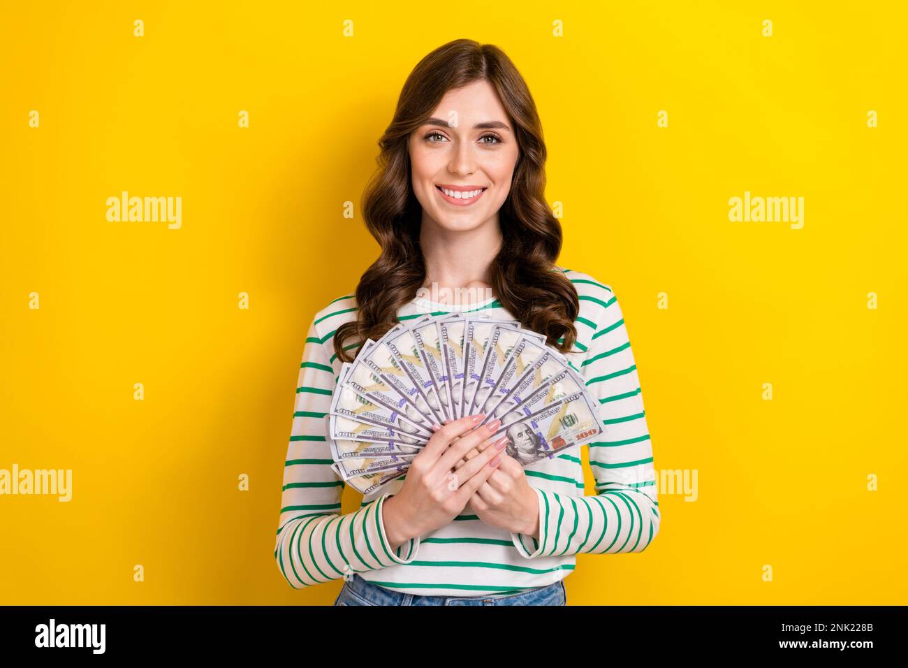 Photo portrait of lovely young lady holding money fan rich successful ...
