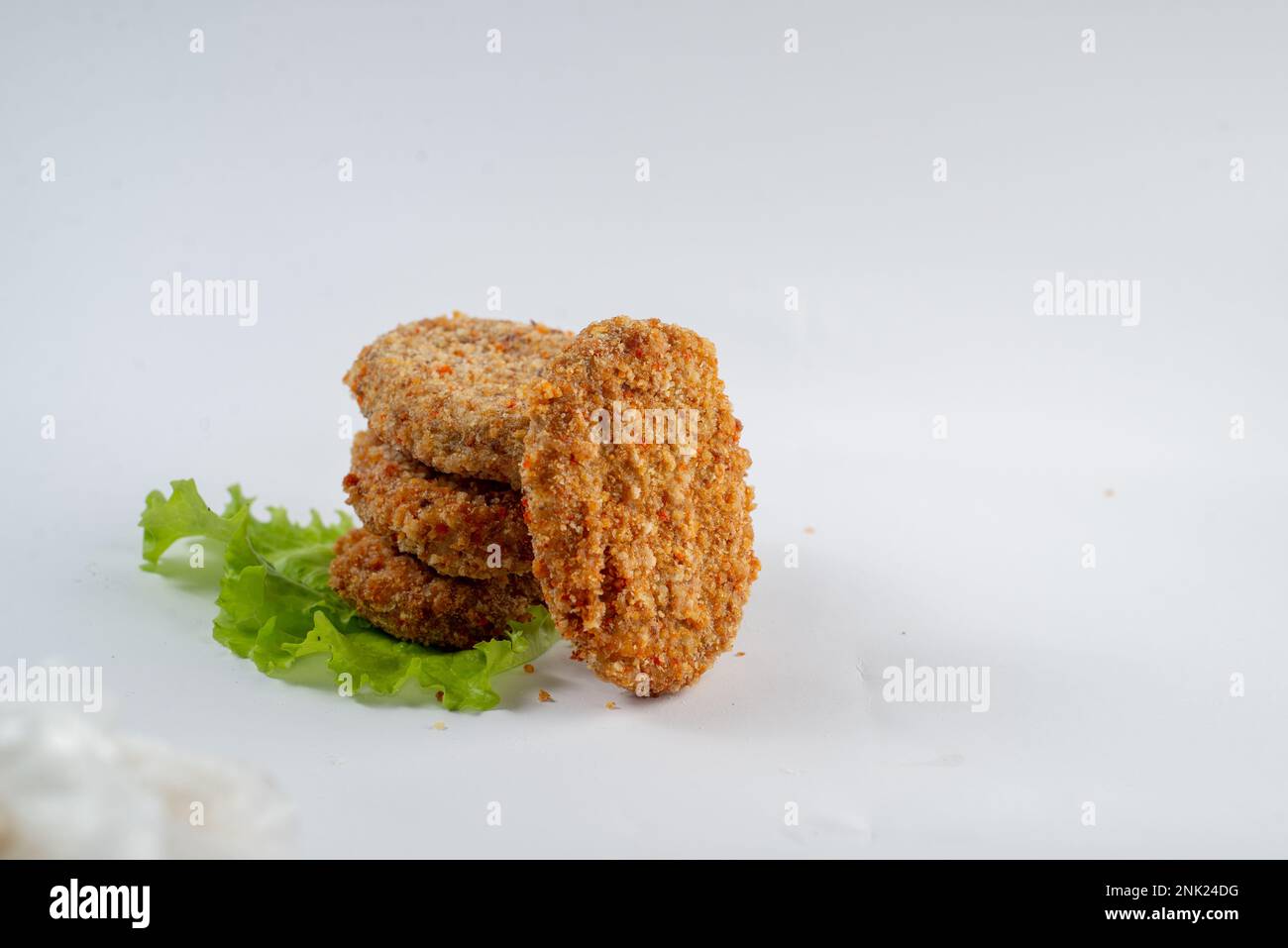 Cutlet frozen semi-finished product on a white background Stock Photo ...