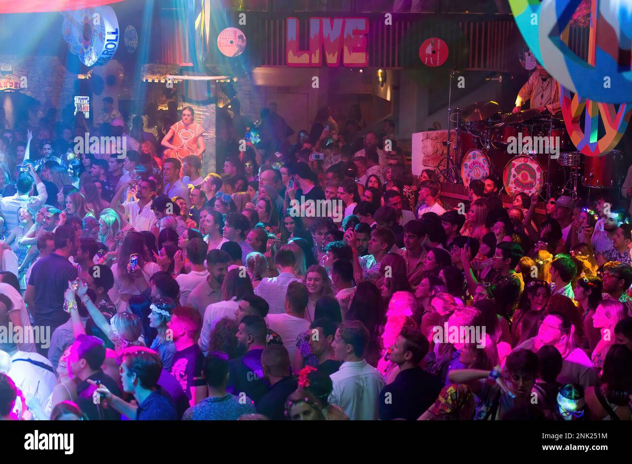 Dozens of people attend the Flower Power party at the Pacha Ibiza ...