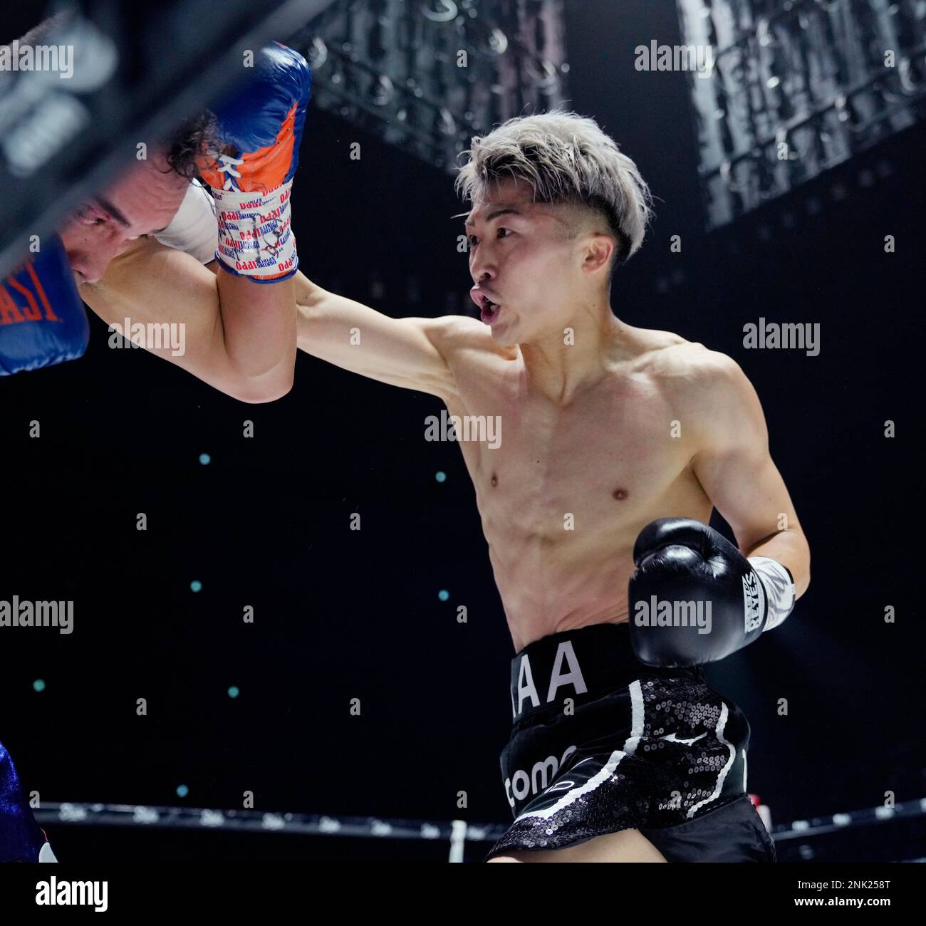 Naoya Inoue of Japan strikes a punch in the 2nd round during the ...