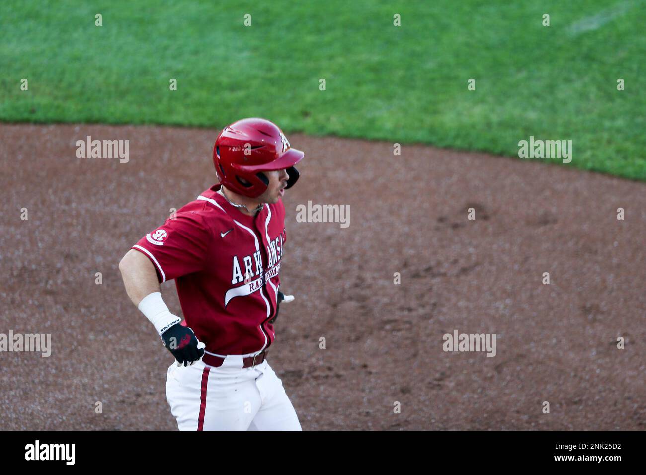 Arkansas outfielder Braydon Webb (24) yells after scoring a run during ...
