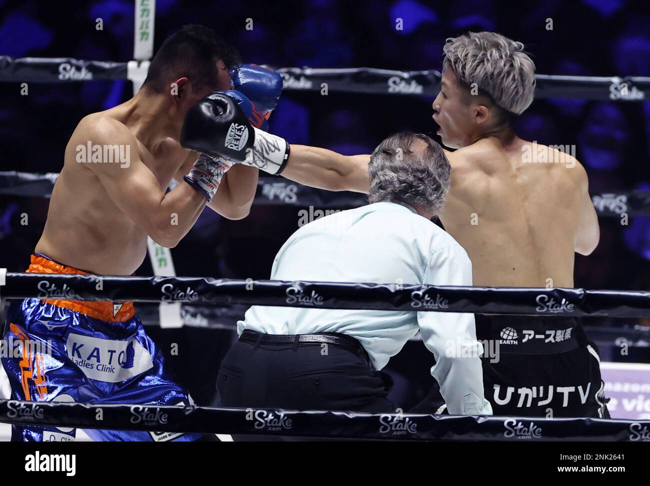 Naoya Inoue of Japan strikes a punch in the 1st round during the ...