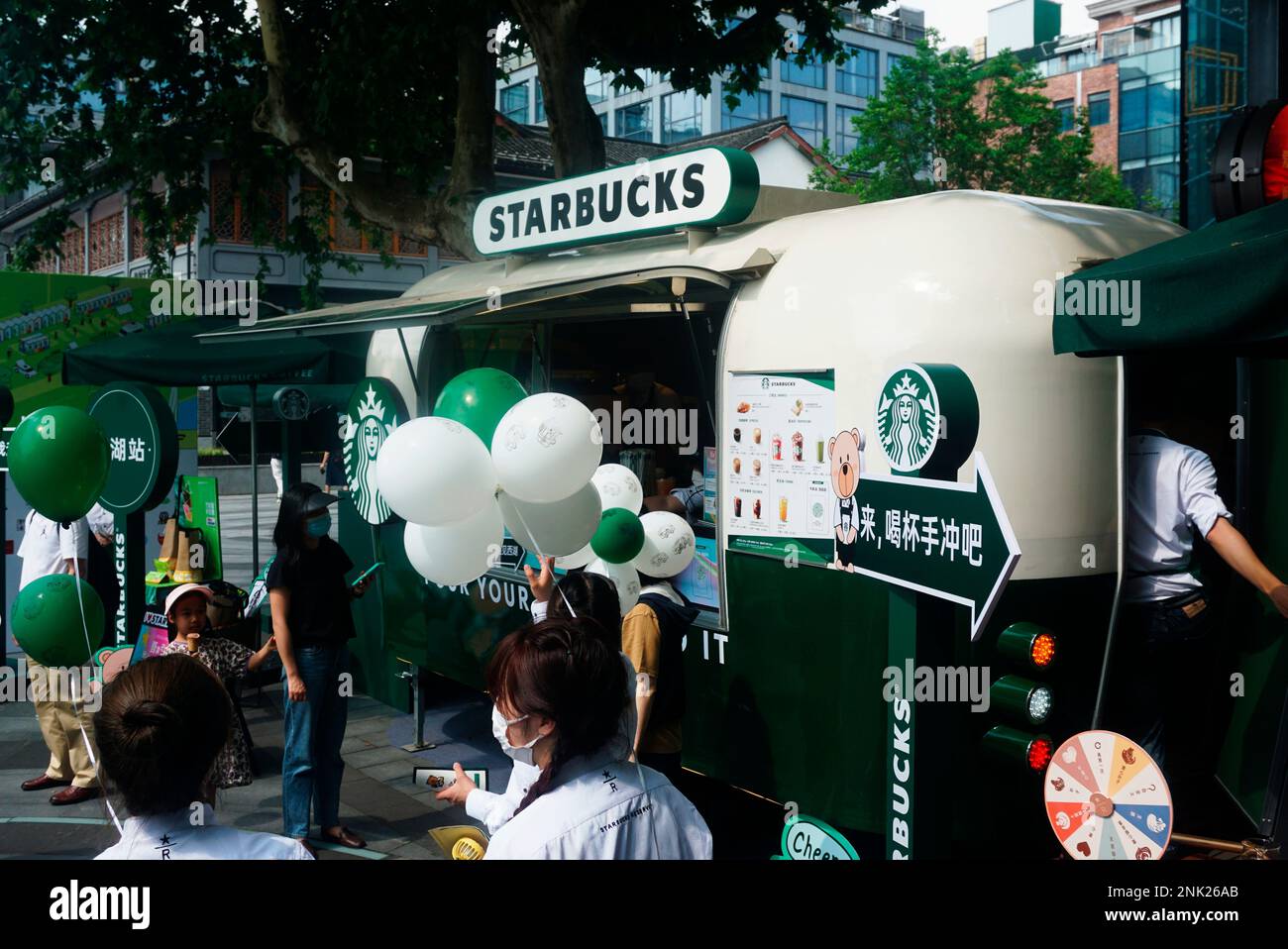 A view of the Starbucks vending van during its debut in Hangzhou in ...