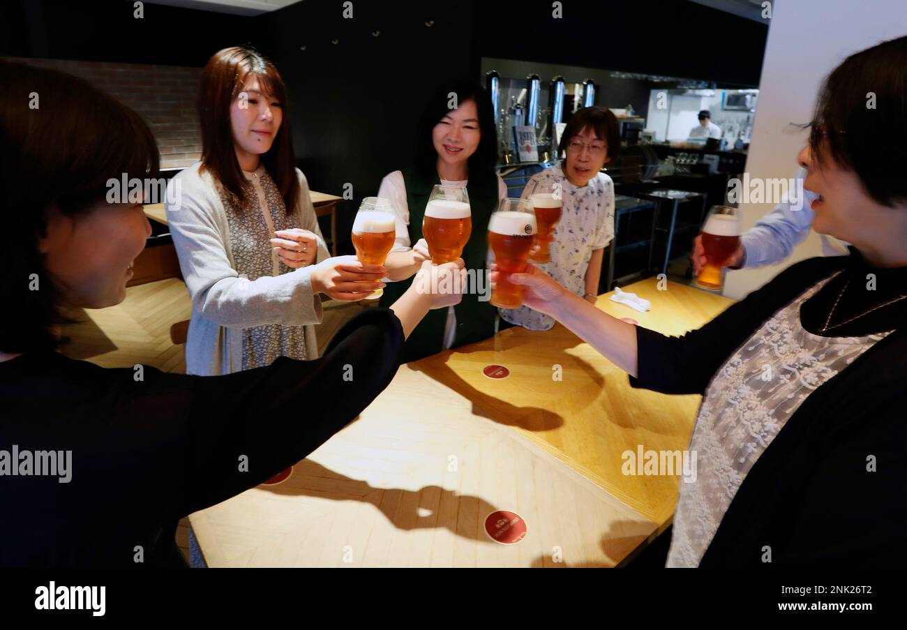 People enjoy drinking craft beer at Spring Valley Brewery Tokyo in ...