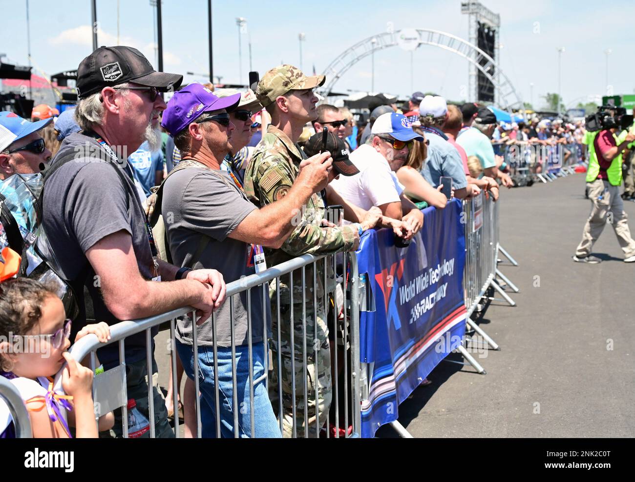 MADISON, IL - Spectators line the fences to watch activity in the ...
