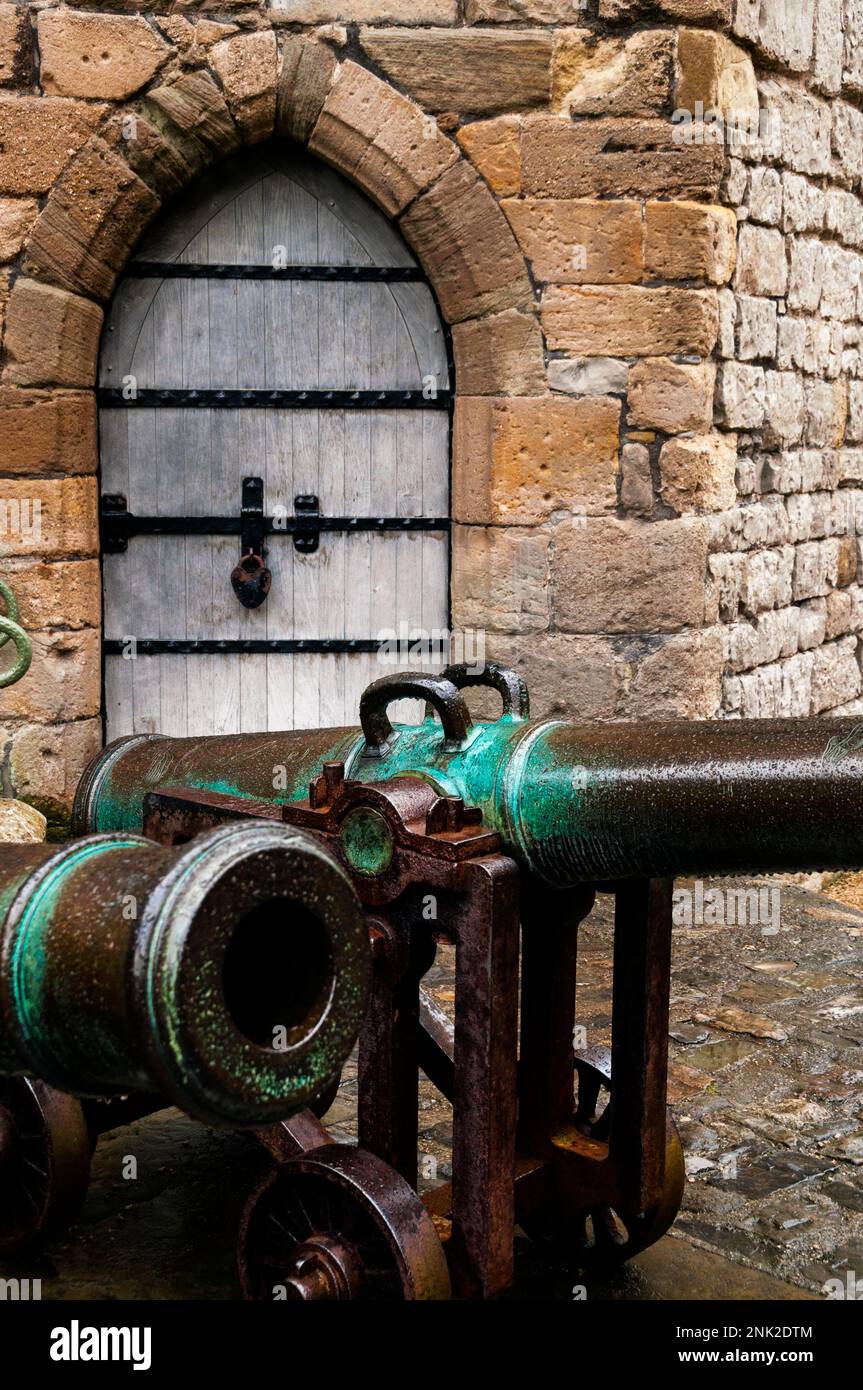 Pointed arch castle gate of Caernarfon Castle in the royal seaside town ...