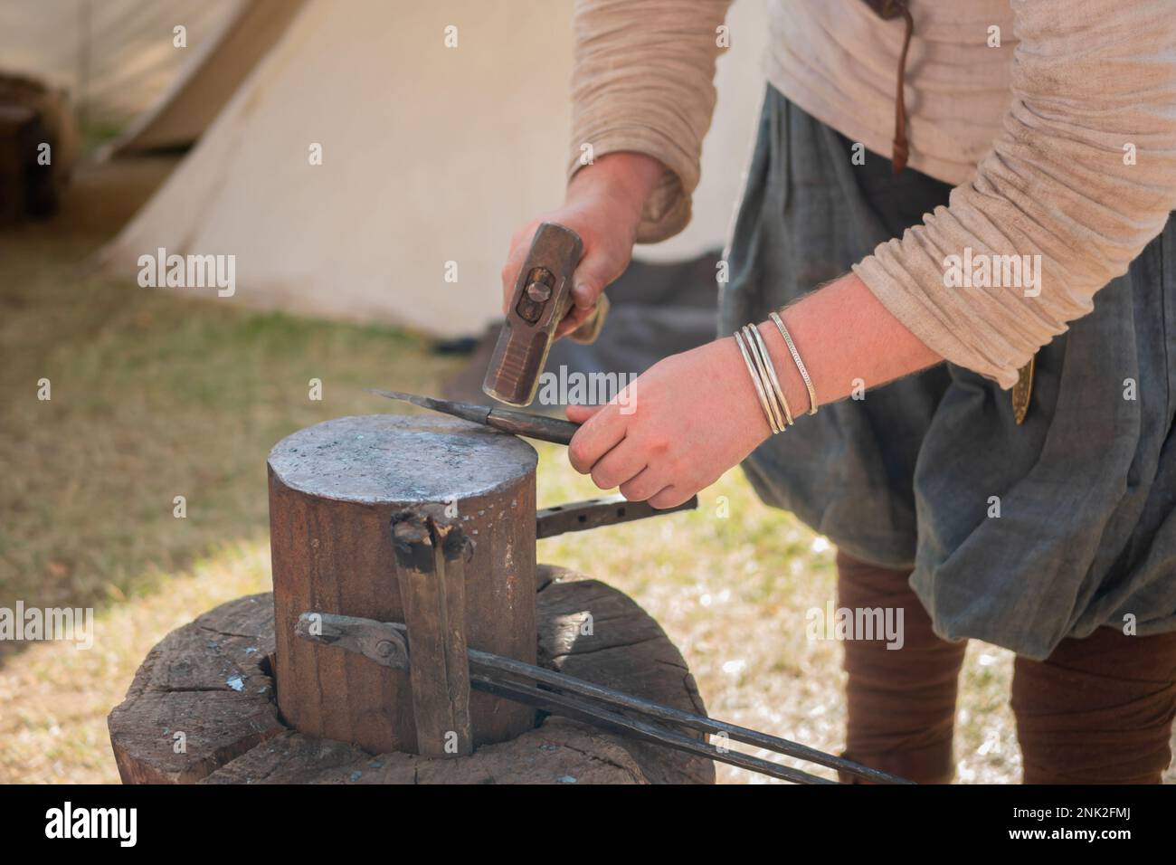 Blacksmith at work medieval art hi-res stock photography and images - Alamy