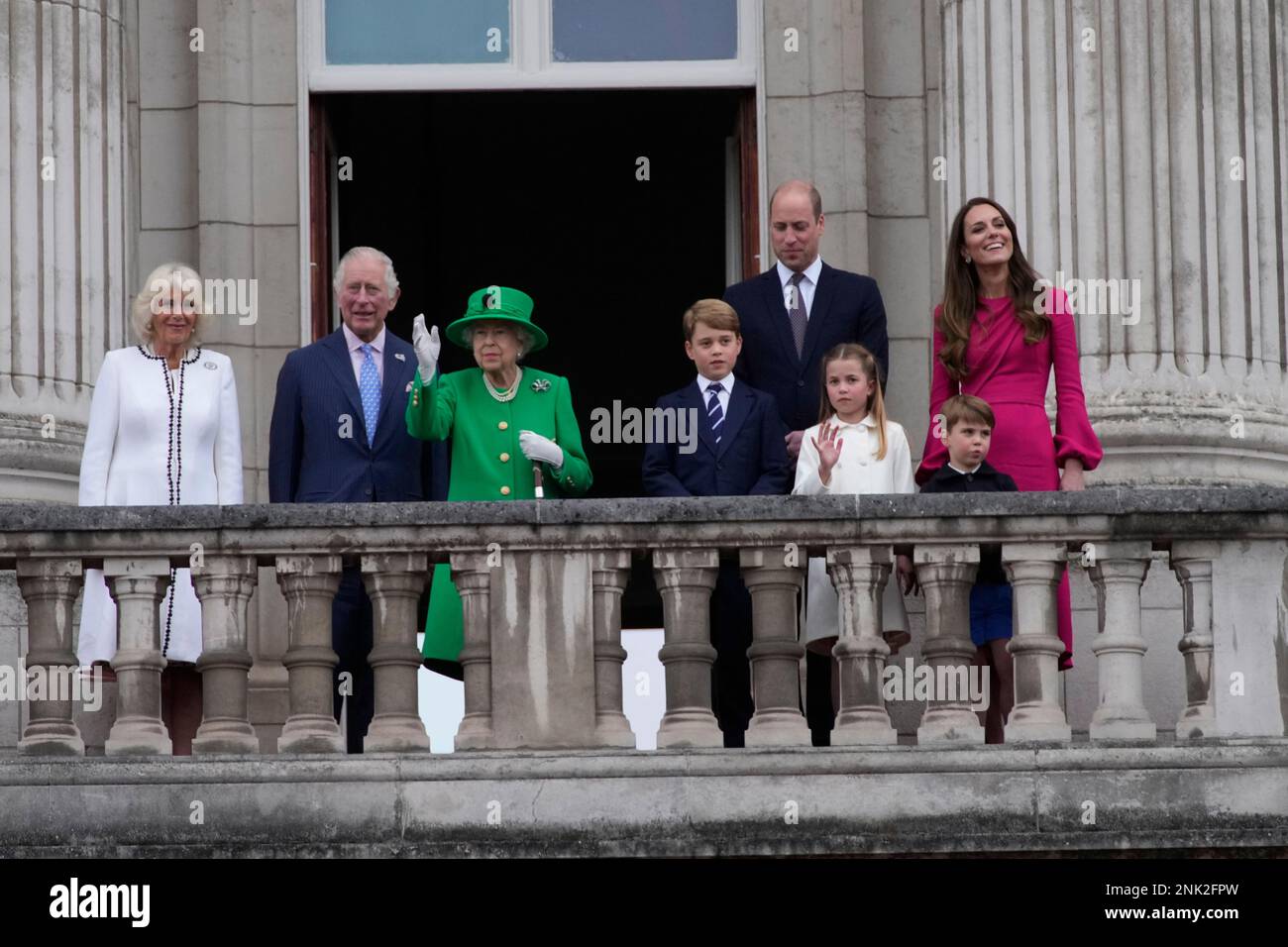Queen Elizabeth II stands on the balcony with the Royal family during ...