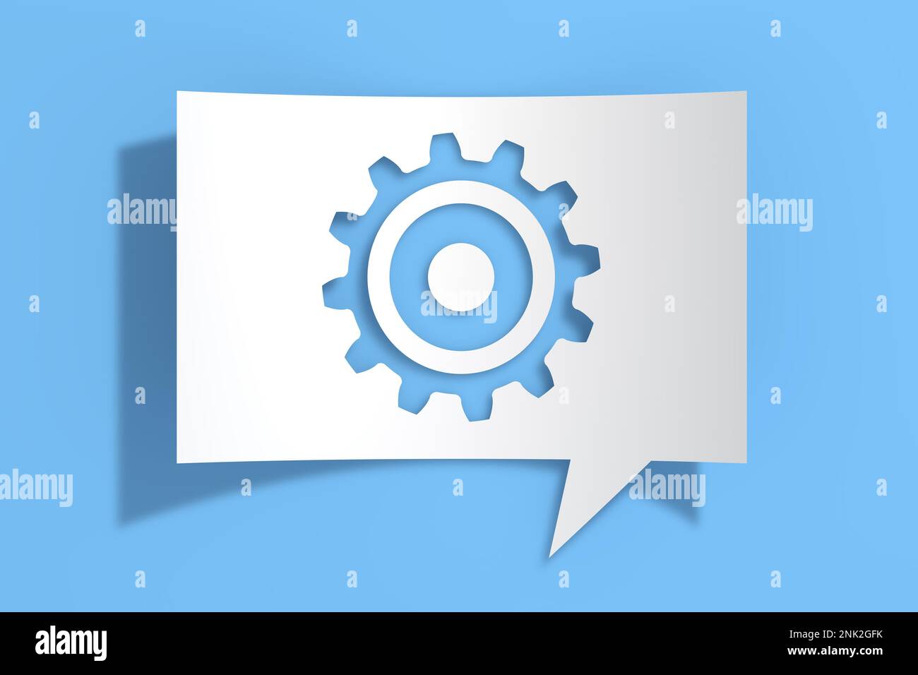 Cog Wheel Gear Icon on Cutout White Paper Speech Bubble on blue ...