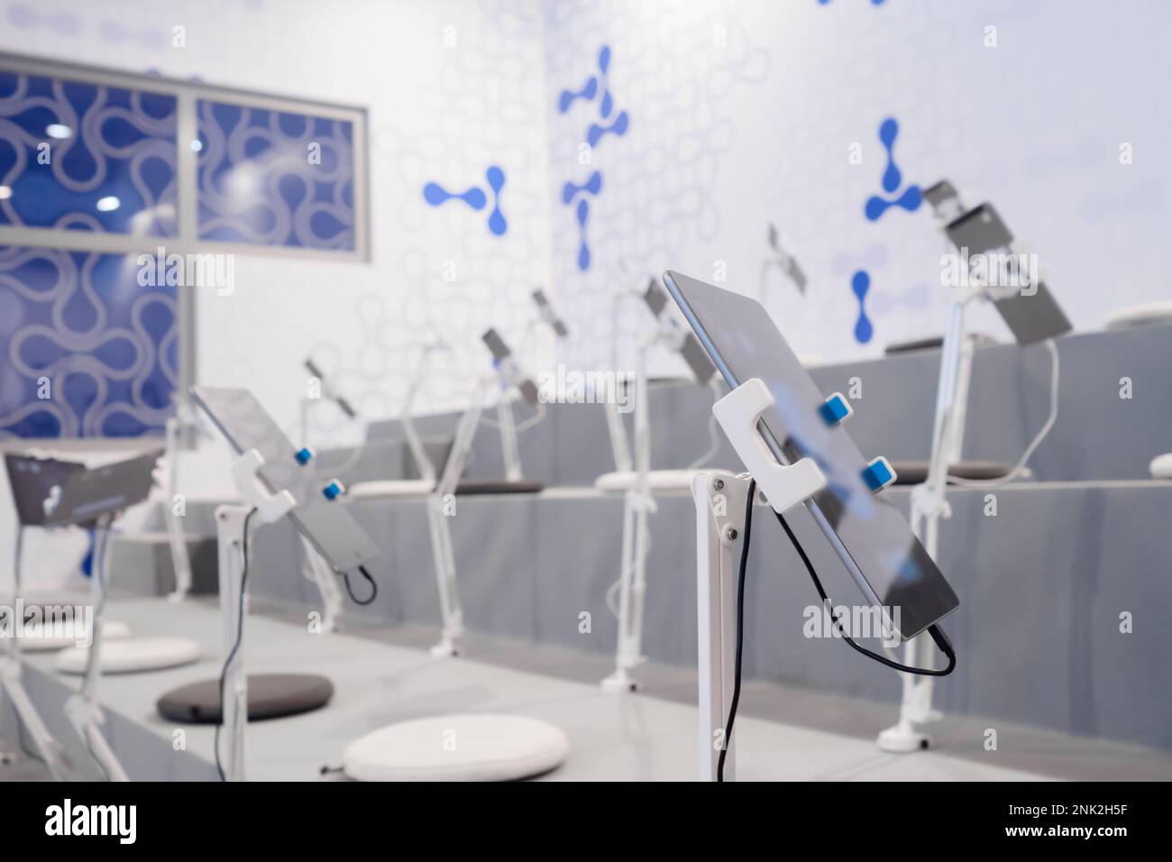 Many floor mount tablets at science exhibition, museum, auditorium or ...