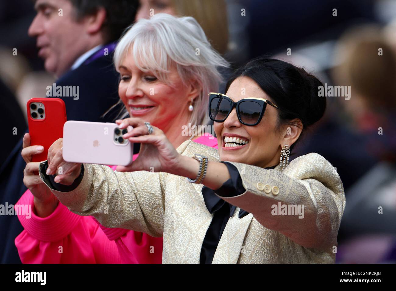 British MP's Nadine Dorries, left, and Priti Patel take selfies before ...