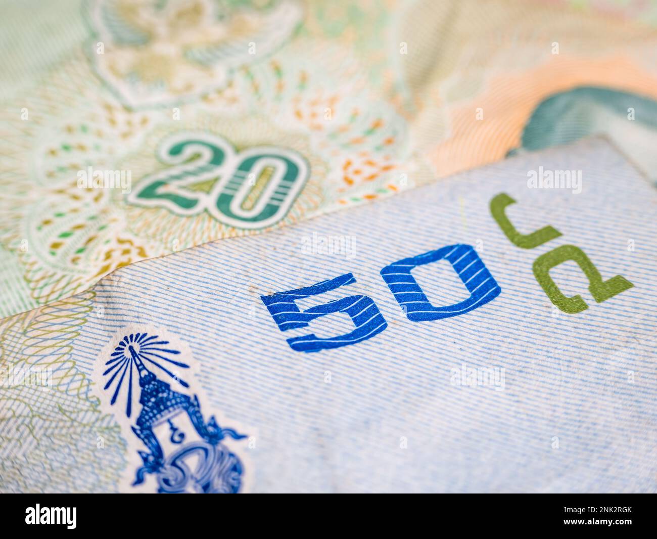 Macro detail with a 50 Thai Baht banknote. the baht is the official ...