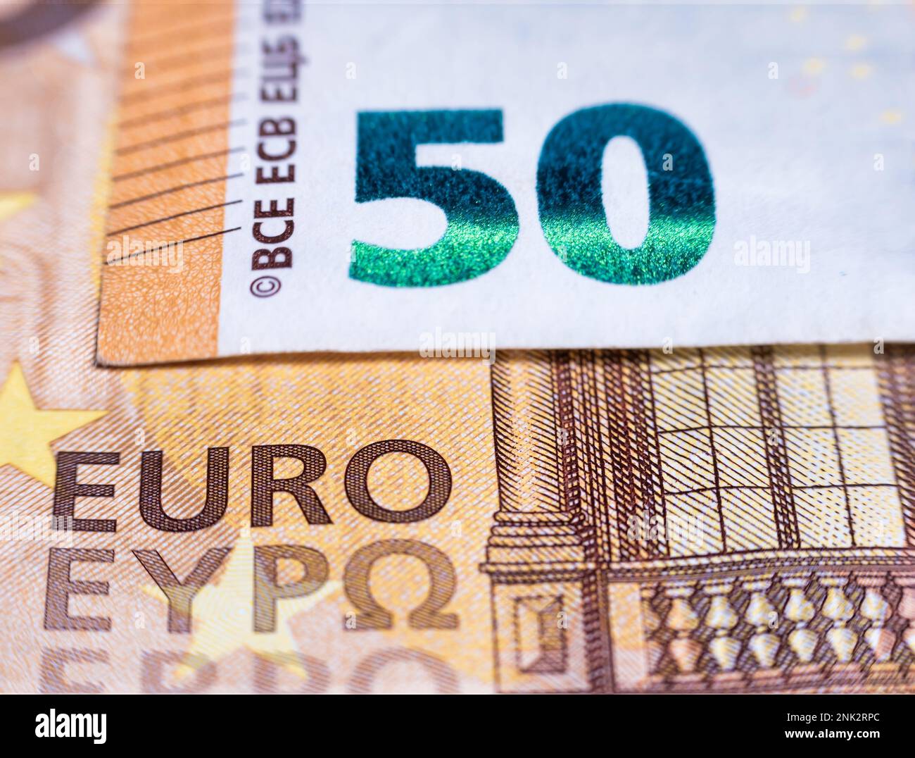 Macro detail with a 50 Euro banknote. Euro is the official currency in ...