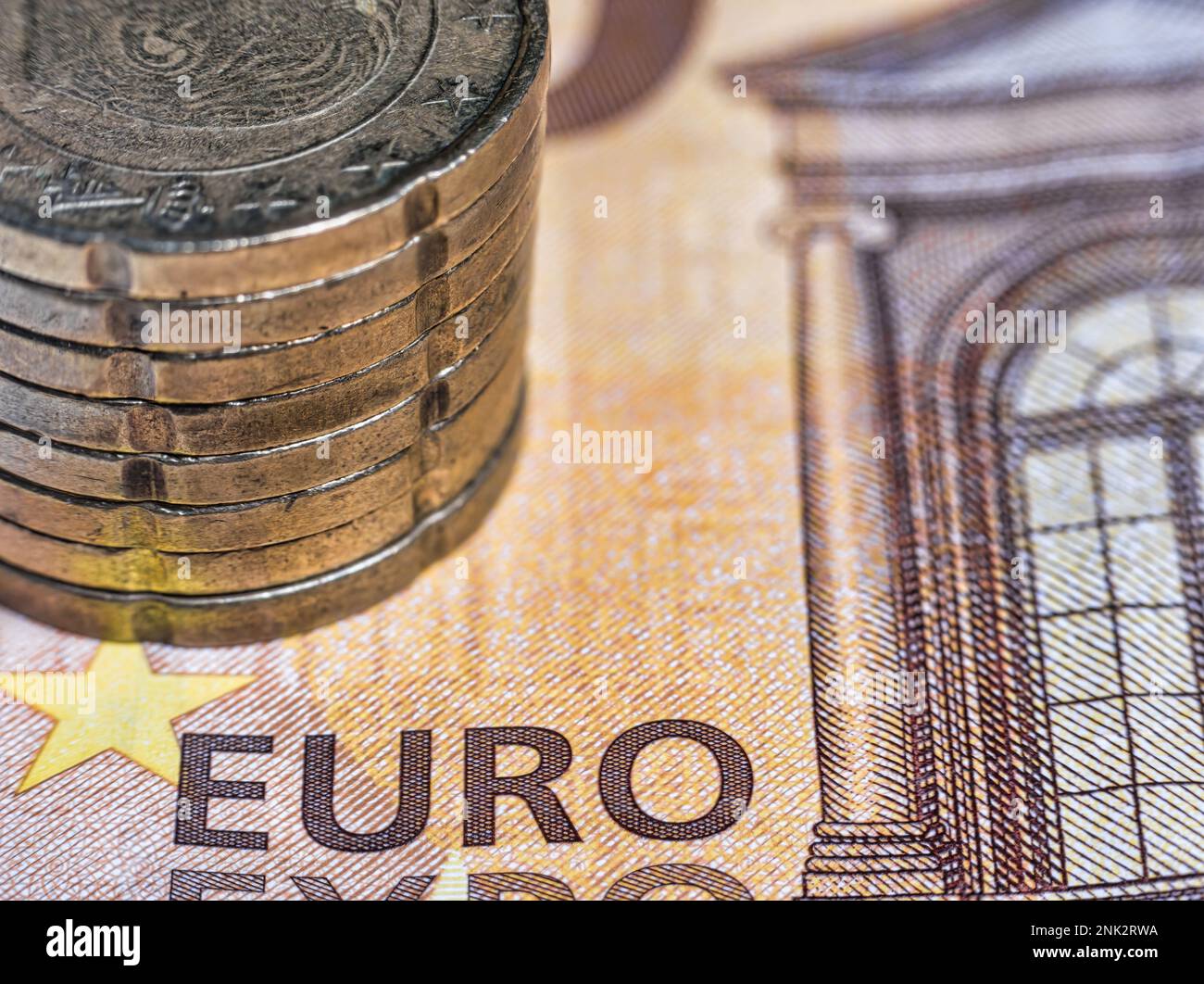 Macro picture with euro cent coins on a 50 Euro Banknote. European ...