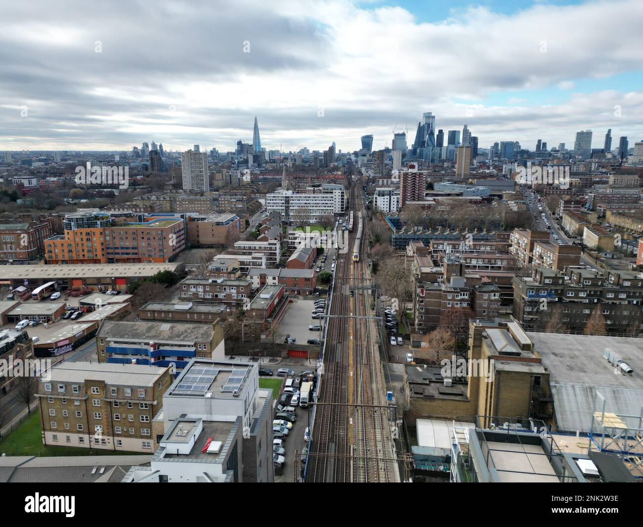 Docklands light railway East London UK drone aerial view Stock Photo ...