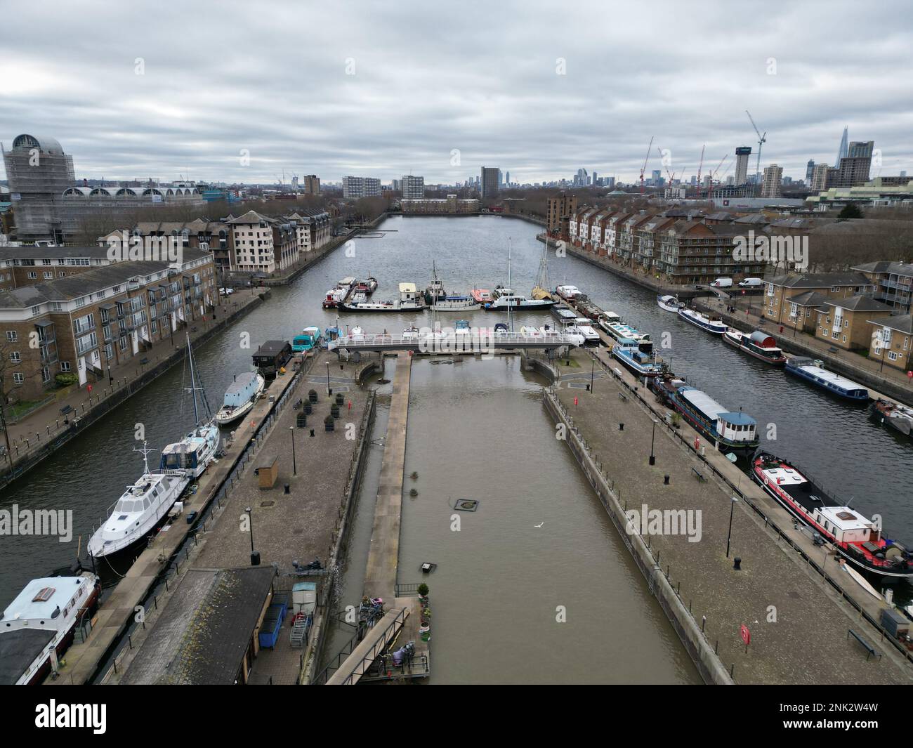 Boats moored Greenland Dock Surrey quays London UK drone aerial view ...