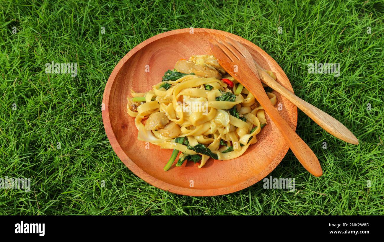 Kwetiau goreng is Chinese Indonesian stir fried flat rice noodle dish ...