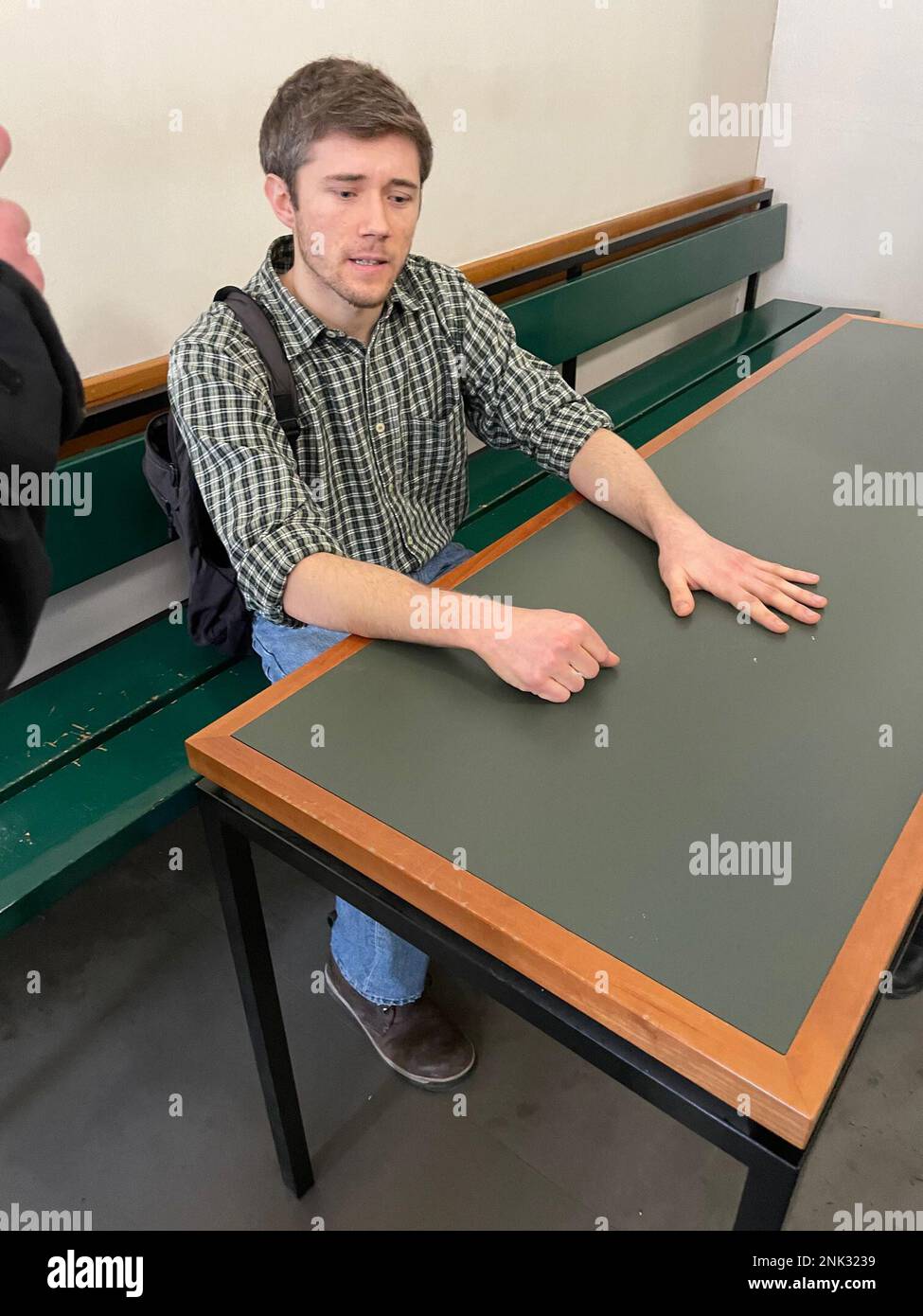 Berlin, Germany. 23rd Feb, 2023. Climate activist Henning Jeschke sits ...