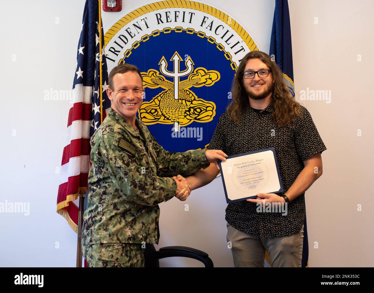 SILVERDALE, Wash. (Aug. 11, 2022) – U.S. Navy Capt. Michael D. Eberlein ...