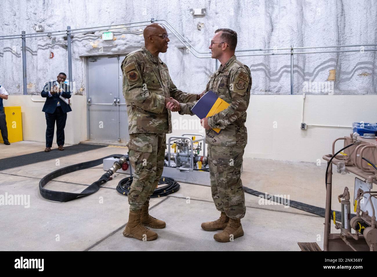 U.S. Air Force Chief of Staff Gen. CQ Brown, Jr., left, presents U.S ...
