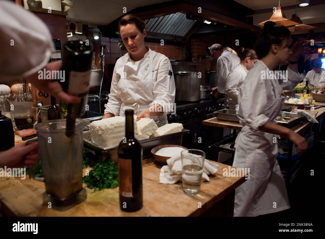 Beth Wells, Co-chef in the Café, preps for the evening seating in the ...
