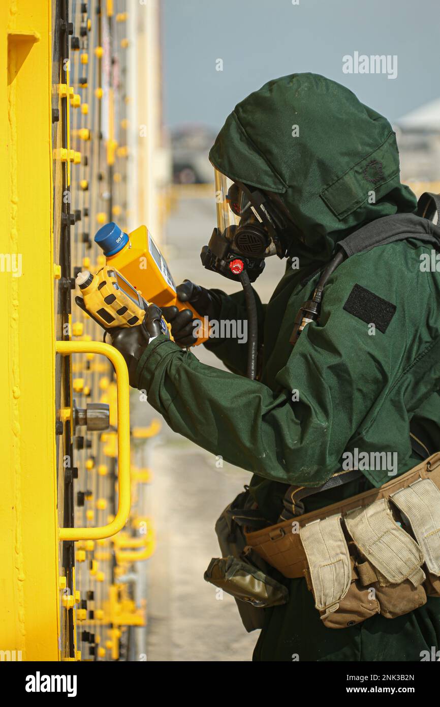 U.S. Marine Corps Lance Cpl. Randy Negrillo, a chemical, biological ...