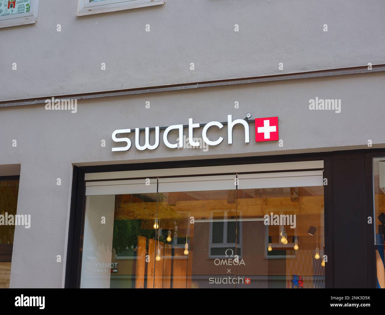 Munich, Germany - August 5, 2022: Facades of buildings Swatch store ...