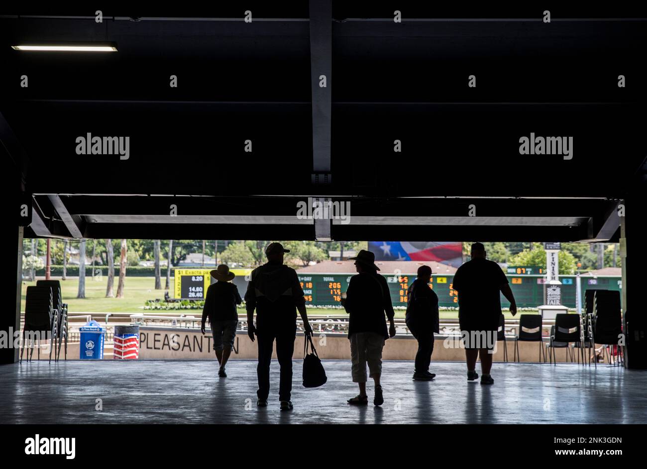 Racing fans move through the main grandstand concourse before the ...