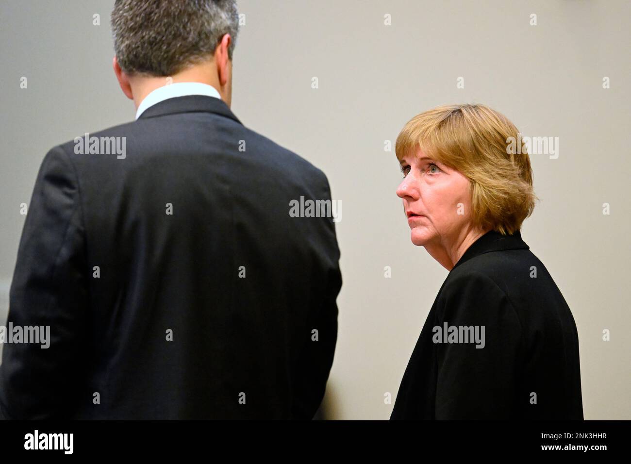Amber Heard's attorneys Elaine Bredehoft and Benjamin Rottenborn stand ...