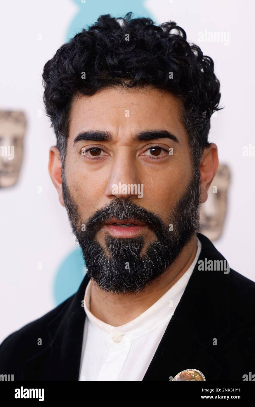Ray Panthaki poses for photographers upon arrival at the 76th British ...