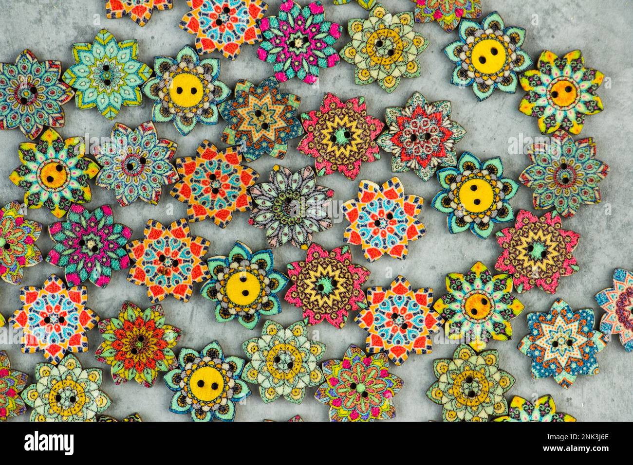 Colorful ornamental button on the gray background, backdrop Stock Photo ...