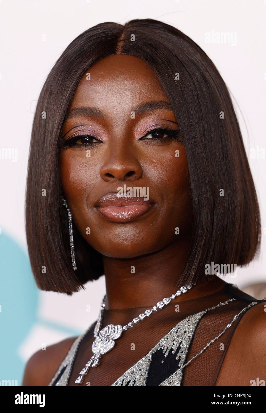 AJ Odudu poses for photographers upon arrival at the 76th British ...