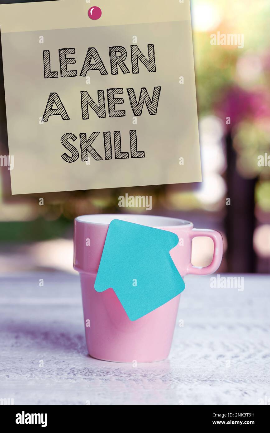 Text caption presenting Learn A New Skill. Word Written on acquisition knowledge through study ...