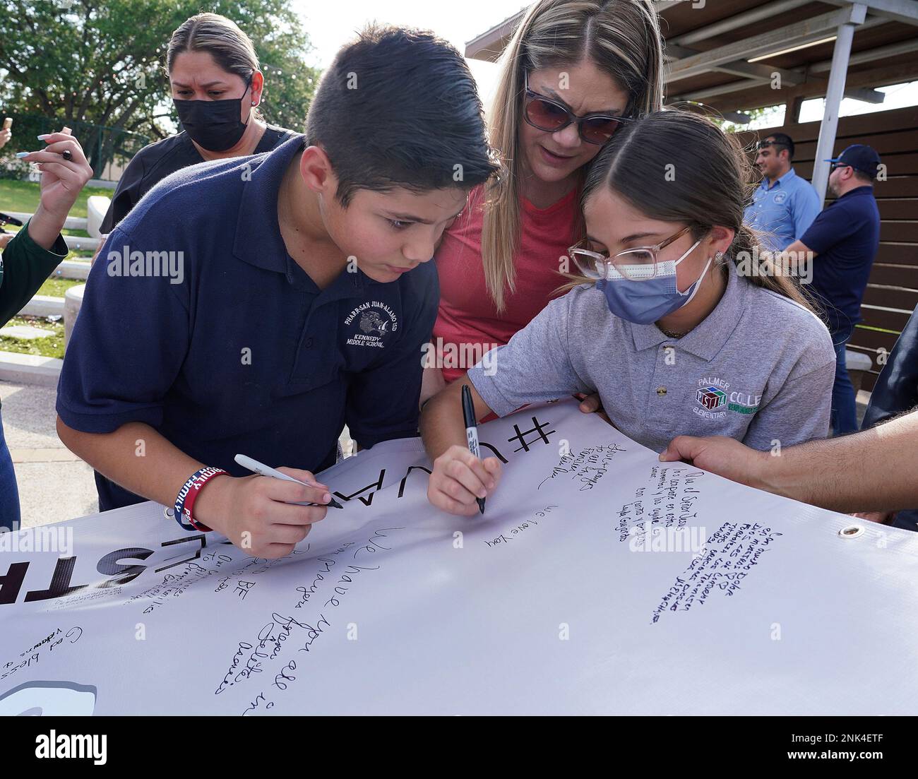 Omahar Padillo, 12, and his sister Samantha Padillo, 9, accompanied by ...