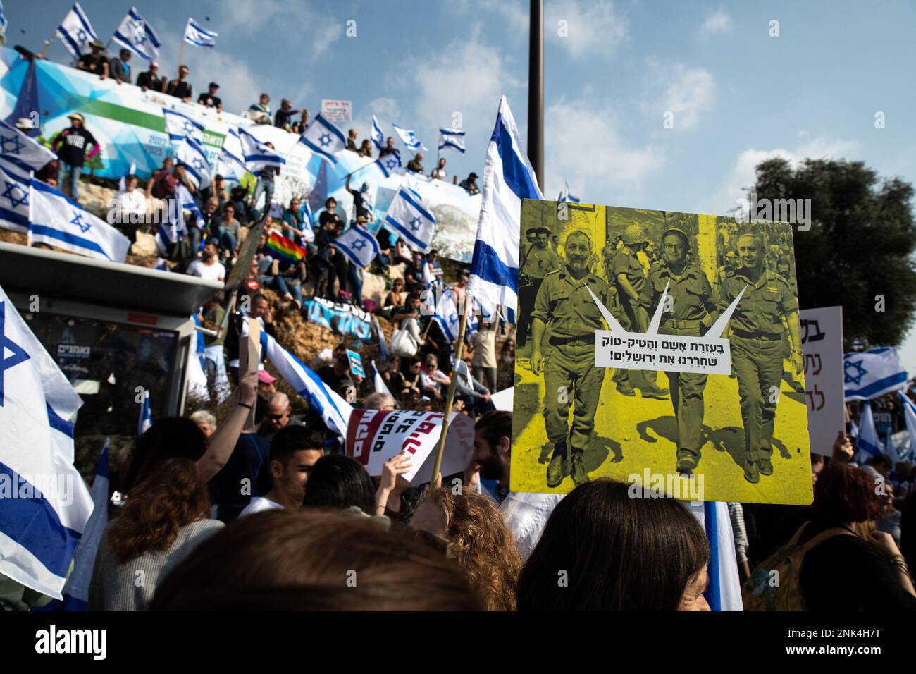 Israel. 20th Feb, 2023. Israeli protestors hold a signboard with Aryeh ...