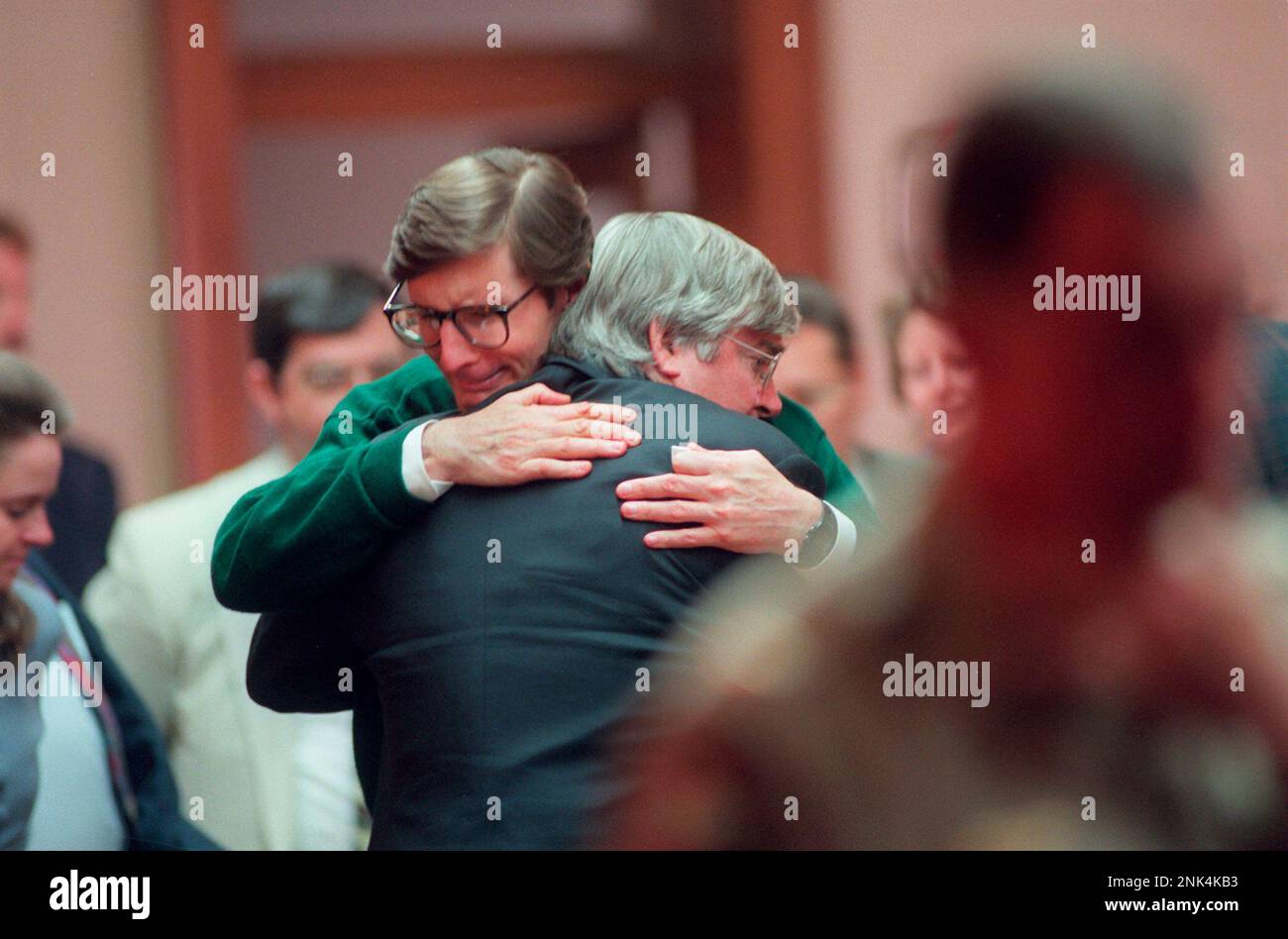 Fred Tokars hugs his attorney, Ed Moriarity, after he was sentenced to ...