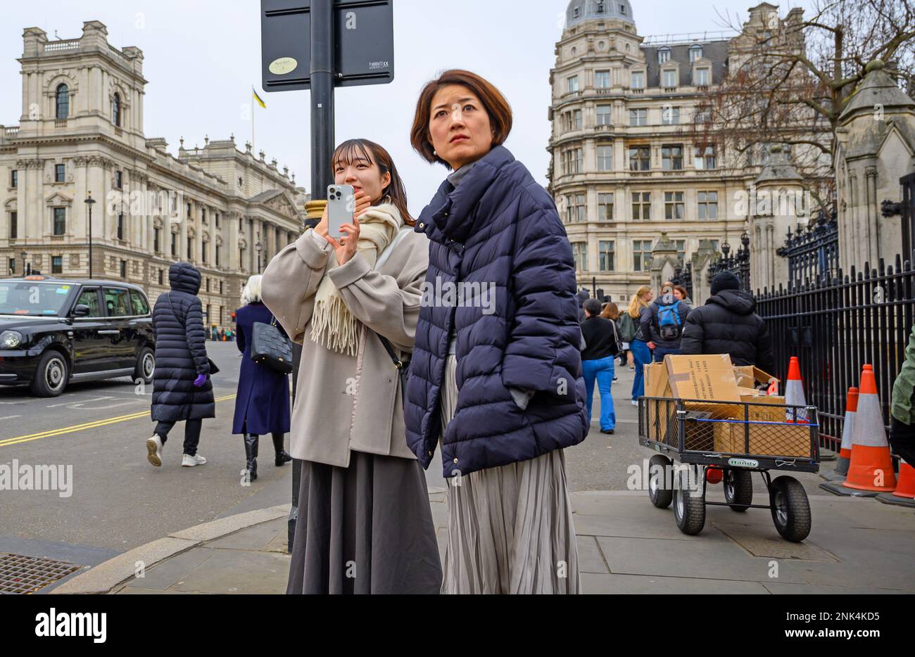 London, England, UK. Asian tourists in Parliament Square Stock Photo ...